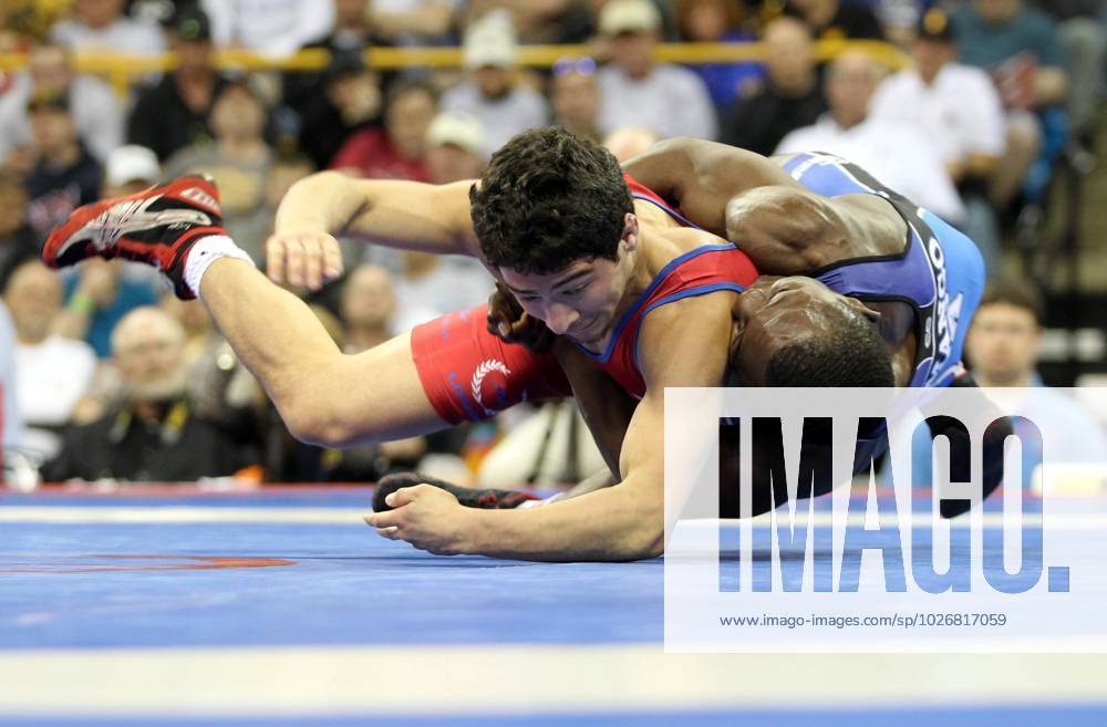 Wrestling: U.S. Olympic Team Trials April 21, 2012; Iowa City, IA, USA; Spenser Mango (blue
