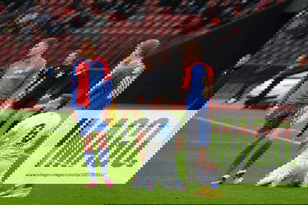 - Fc Zurich Defender Fidan Aliti (6) on their kees between Fc Basel ...