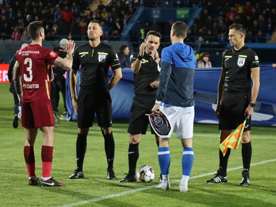 The referees team of Daniel Mitruti, Sebastian Coltescu, Vladimir ...