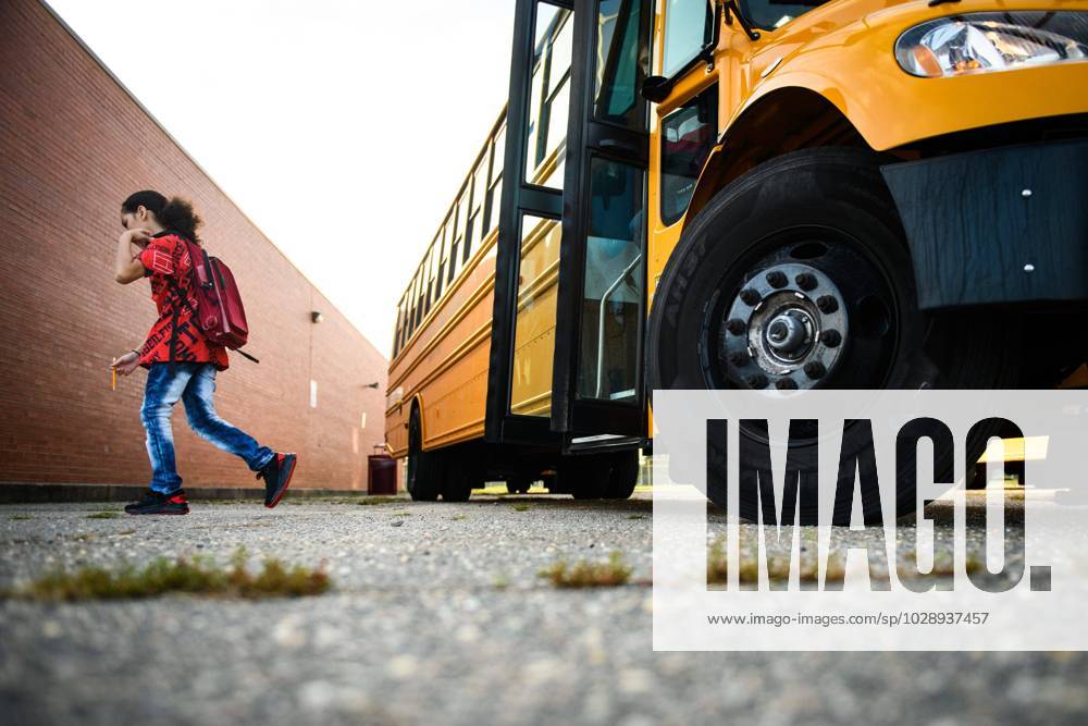 Syndication: The Fayetteville Observer A student steps off the school ...