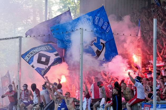 The fans of Hamburger SV HSV ignite pyrotechnics in the fan curve ...
