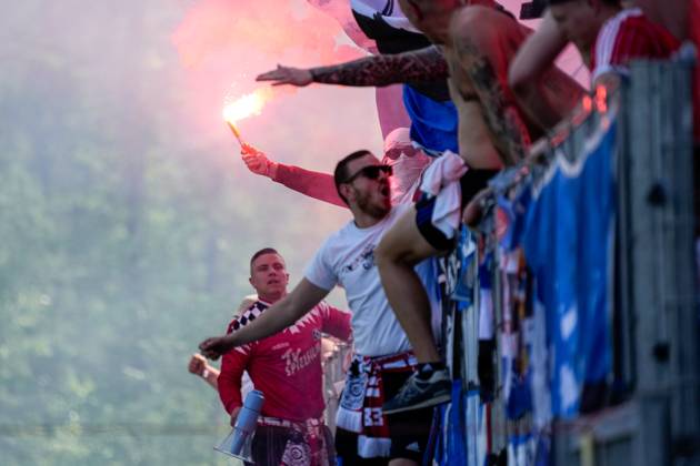 The fans of Hamburger SV HSV ignite pyrotechnics in the fan curve ...