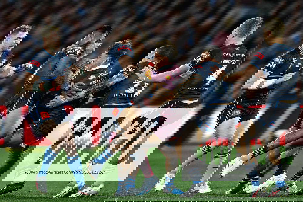 STATE OF ORIGIN I, Reece Walsh of the Maroons is tackled by Tyson ...