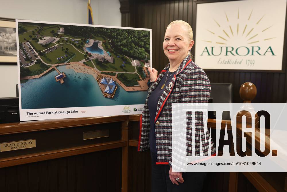 Syndication: Kent Ravenna Record-Courier Aurora Mayor Ann Womer Benjamin shows a conceptual drawing