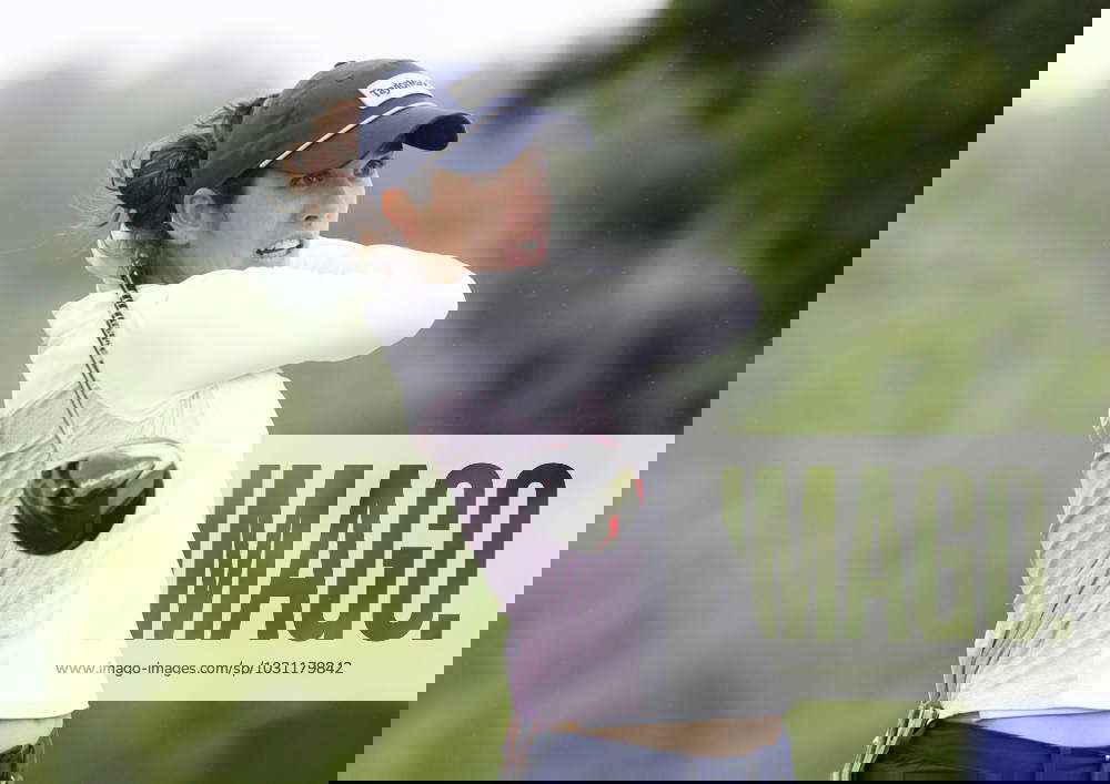 Maria Fassi of Mexico hits her tee shot on the 14th hole in the first ...