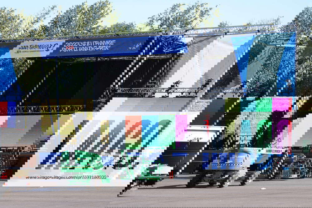 Hanging the large TV screens while setting up the podium at Allianz Fan ...