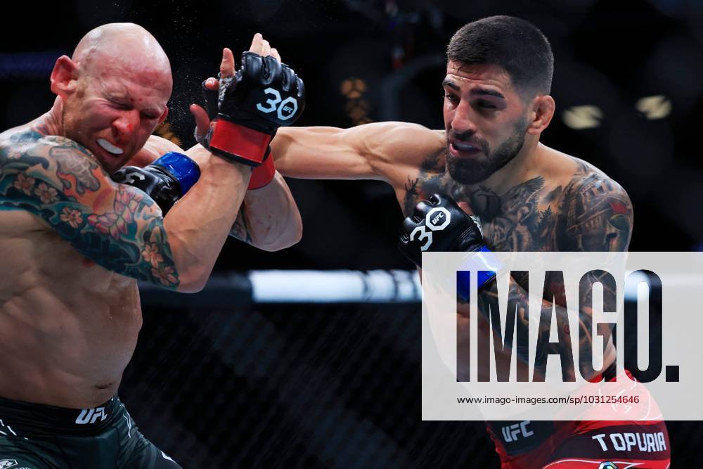 Syndication: Florida Times-Union Ilia Topuria lands a punch on Josh ...