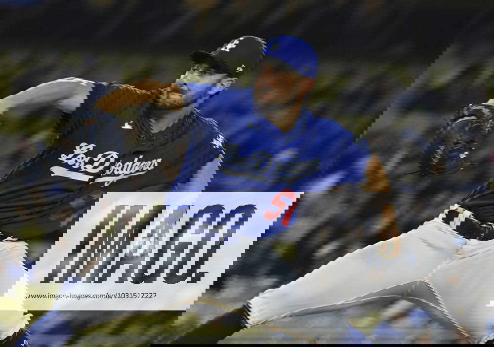 Los Angeles Dodgers relief pitcher Alex Vesia winds up to deliver ...