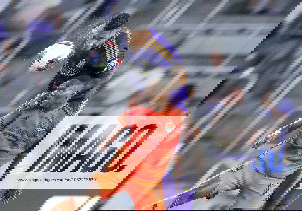 ORLANDO, FL - JULY 21: Orlando City defender AntÃ nio Carlos (25) heads ...