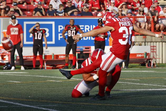 Calgary, Ab, Canada: Calgary Stampeders Marken Michel, centre, is ...