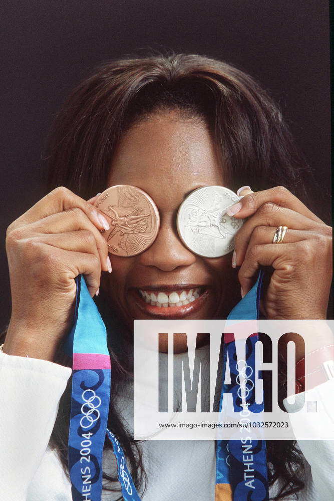 71905 03 French fencer Laura Flessel-Colovic with 5 Olympics medals, 2 ...