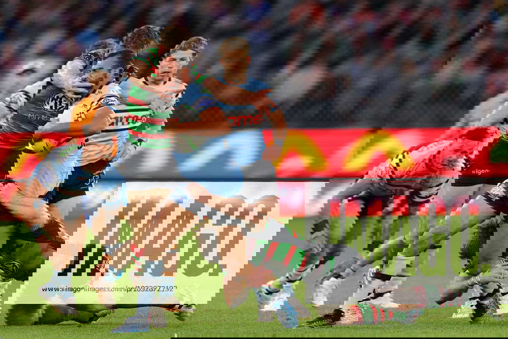 NRL RABBITOHS SHARKS, Toby Rudolf of the Sharks is tackled during the ...