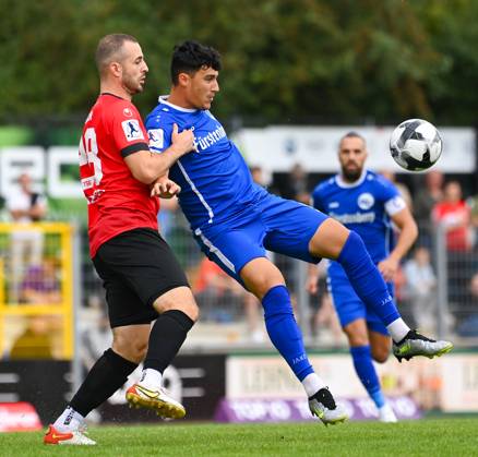 Ivan Novakovic Bahlinger SC, 9 is pressured from behind by Jonas Vogler ...