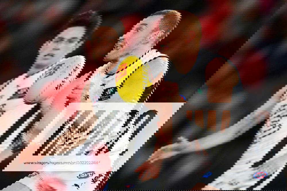 AFL SAINTS BLUES, Matthew Cottrell of the Blues handballs during the ...