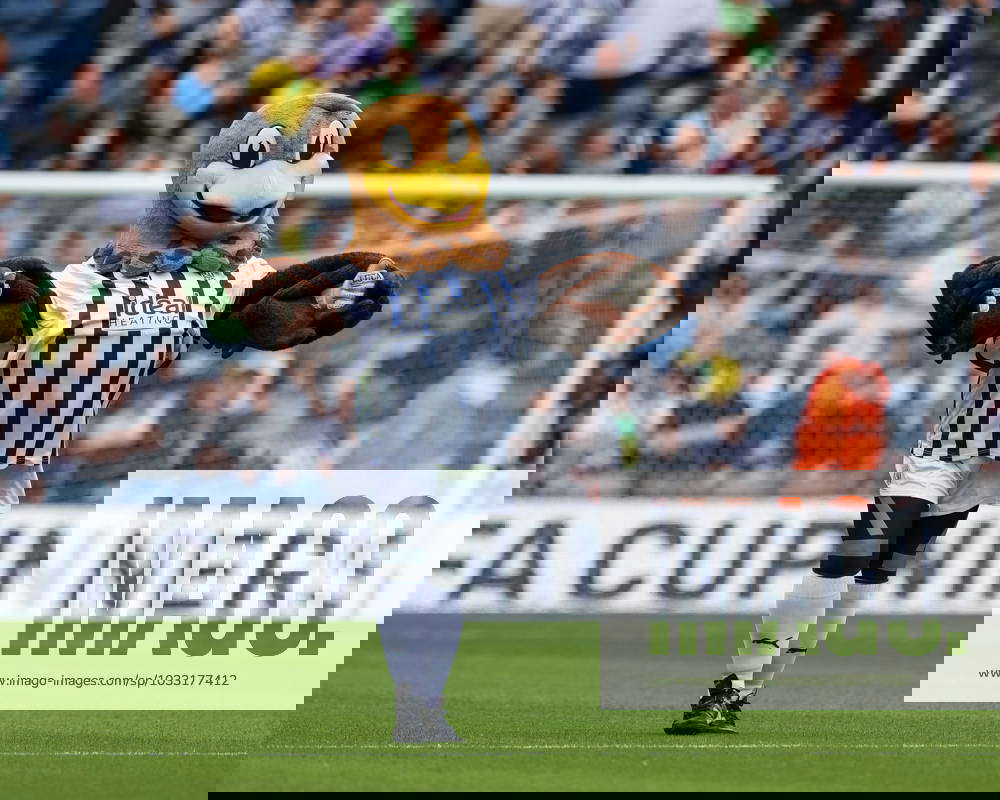 West Bromwich Albion s mascot, Baggie bird encourages the home fans ...