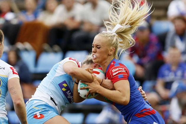 NRLW KNIGHTS TITANS, Jasmin Strange of the Knights is tackled by ...