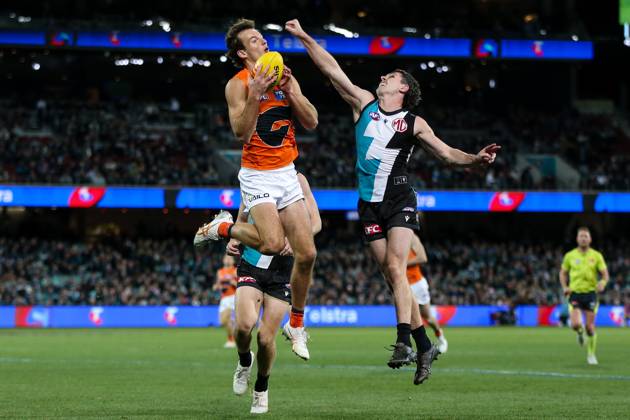 AFL POWER GIANTS, Jack Buckley of the Giants marks the ball over Darcy ...