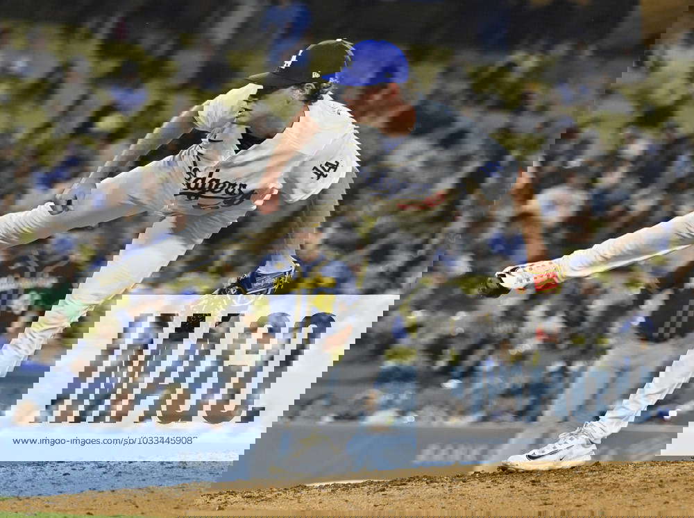 Los Angeles Dodgers reliever Gus Varland delivers against the Milwaukee ...