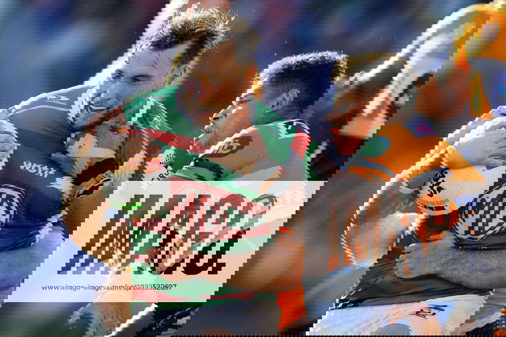 NRL KNIGHTS RABBITOHS, Jacob Host of the Rabbitohs is tackled by Dane ...