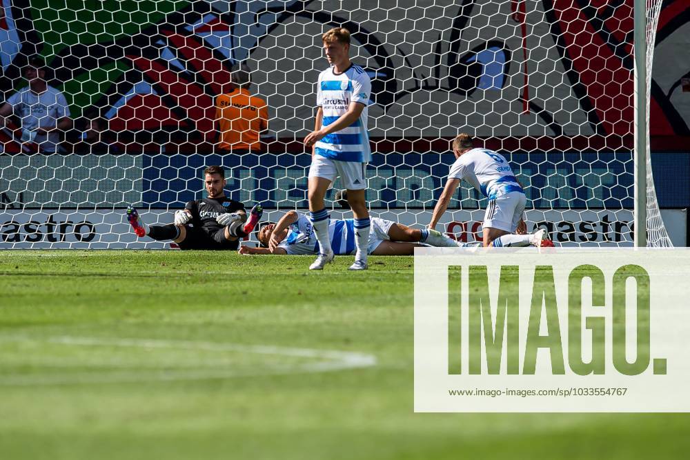 ENSCHEDE - (l) PEC Zwolle goalkeeper Jasper Schendelaar lies defeated ...