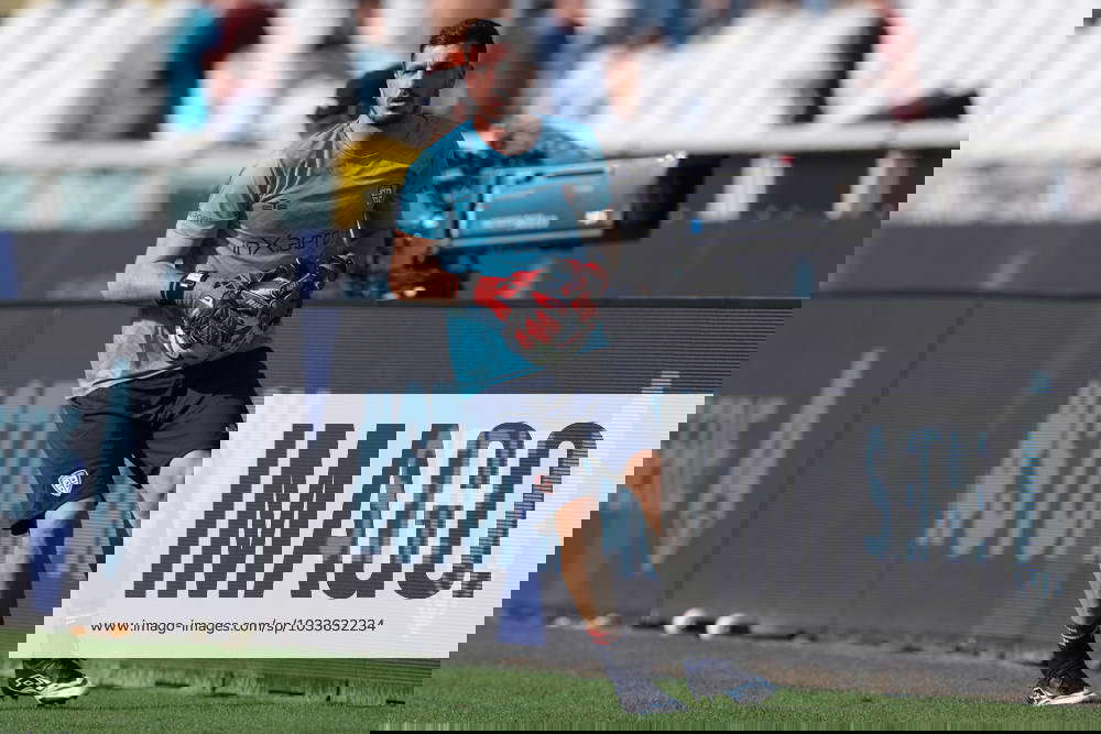 Turin, Italy, 21st August 2023. Simone Scuffet of Cagliari warms up ...