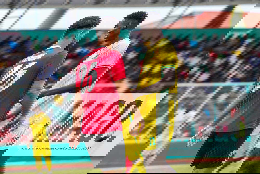 BENIN, NIGERIA - AUGUST 19: Imade Osarenkhoe of Insurance and Ahmed Mohamed Kerroum of ASO Chlef