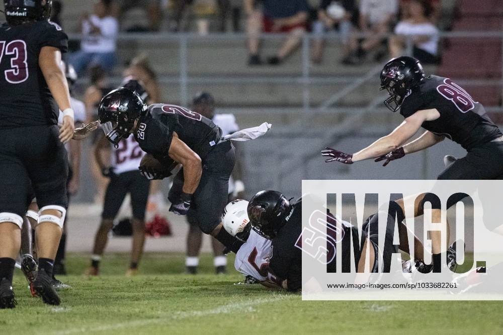 Syndication: News-Journal Connor Mathews (28) gets tripped up while ...