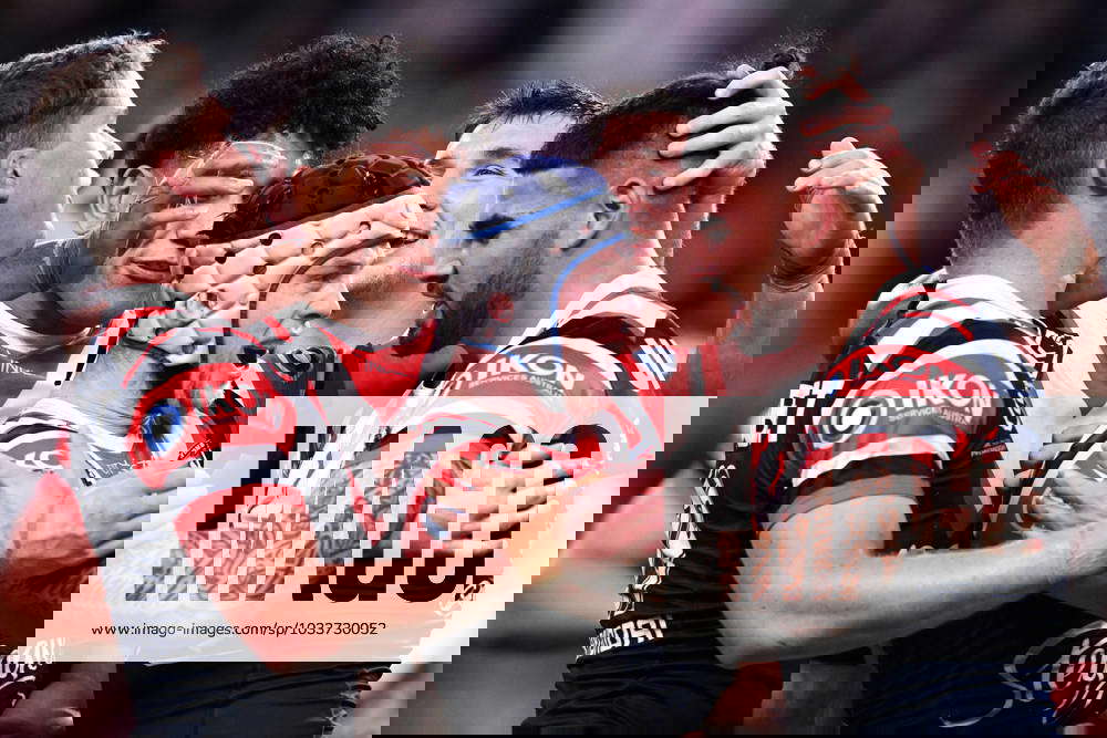 NRL ROOSTERS TIGERS, Terrell May of the Roosters (right) celebrates ...