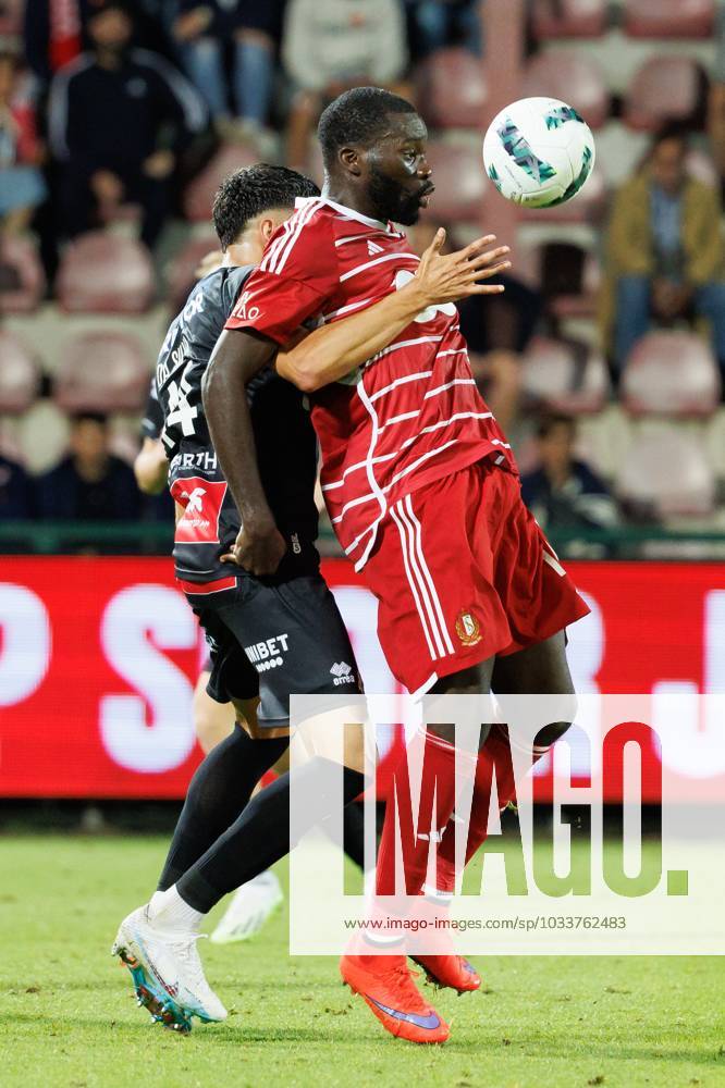 Kortrijk s Joao Silva Eira Antunes and Standard s Wilfried Kanga fight ...