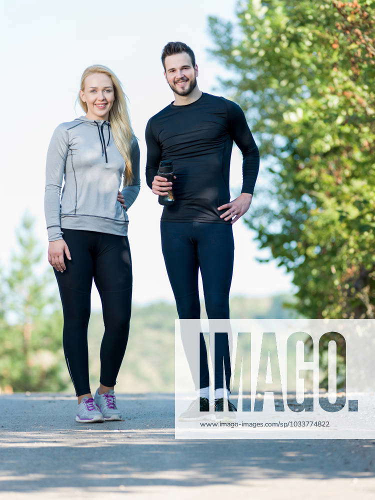 Young health couple doing stretching exercise relaxing and warm up ...