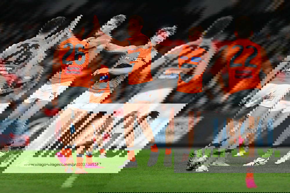 AFL BLUES GIANTS, Lachlan Keeffe of the Giants (centre) celebrates with ...