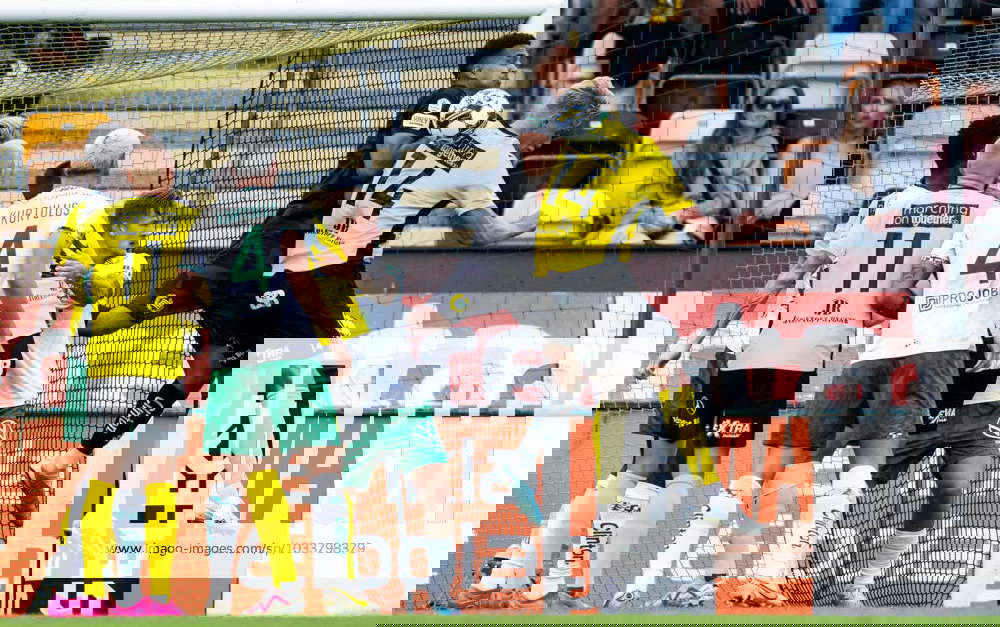 230827 Hammarbys goalkeeper Oliver Dovin and Mjällbys Herman Johansson ...