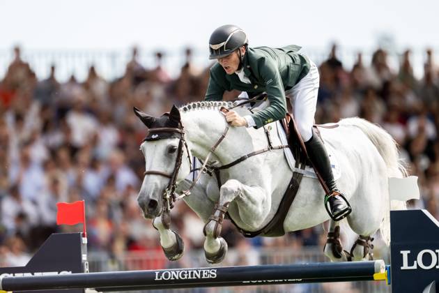 Michael Duffy or Ireland with horse Cinca 3 competes during the team ...