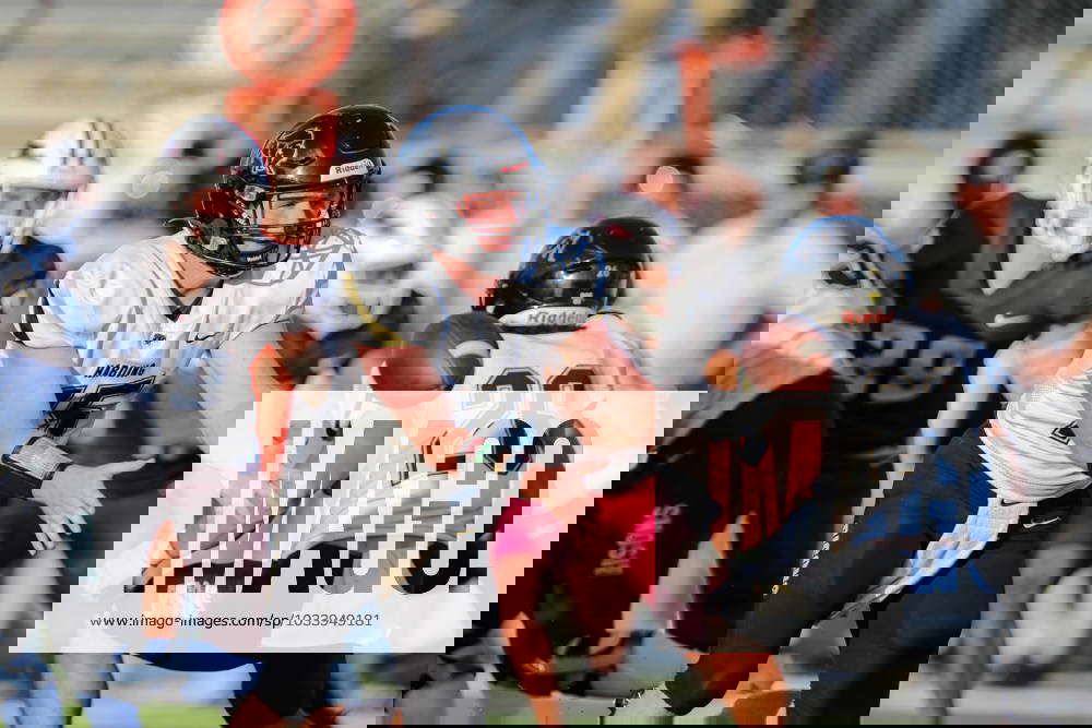 :.Harding University Bison QB Cole Keylon tosses the ball to a running ...