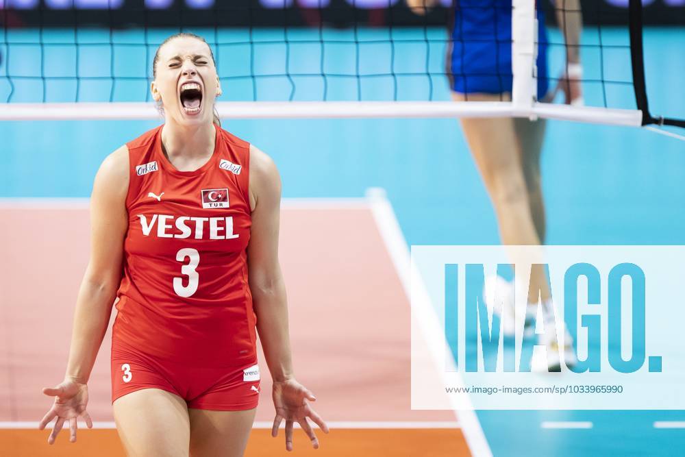 Turkey s Cansu Ozbay reacts during a volleyball game between Turkey and ...