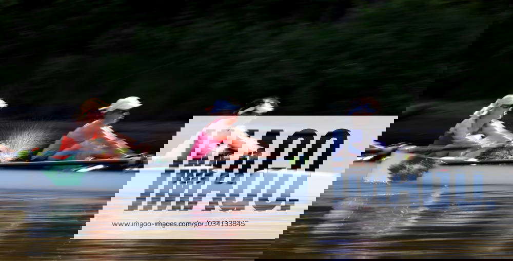 Members of the Minneapolis Rowing Club in a 4 person shell during an ...