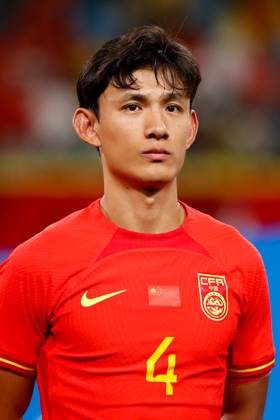 CHENGDU, CHINA - SEPTEMBER 12: Wang Shenchao 4 of China drives the ball ...