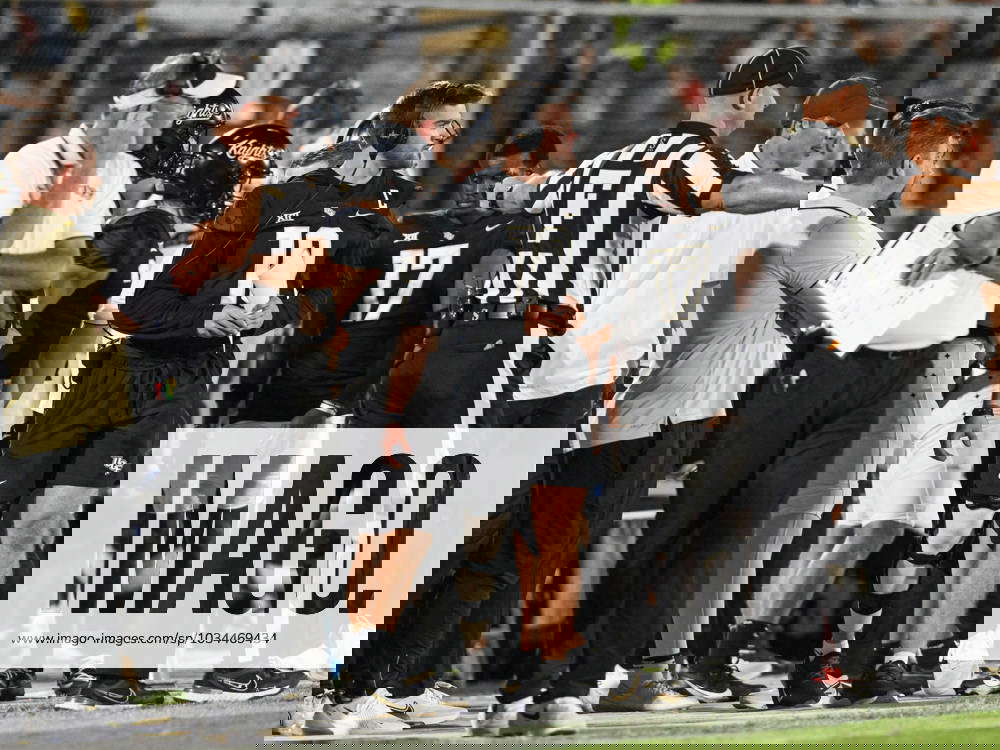 : UCF quarterback John Rhys Plumlee seen on the sideline wearing a leg ...