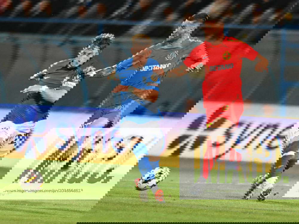 Constantin Grameni and Ovidiu Marian Popescu in the football match ...