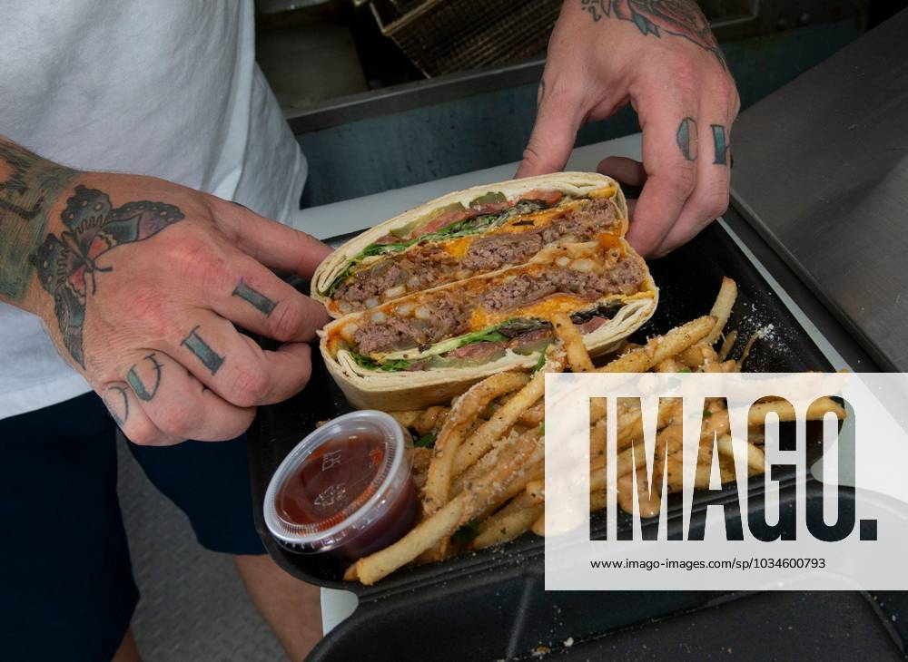 Syndication: News-Journal Chef Rusty Strain shows off a signature menu ...