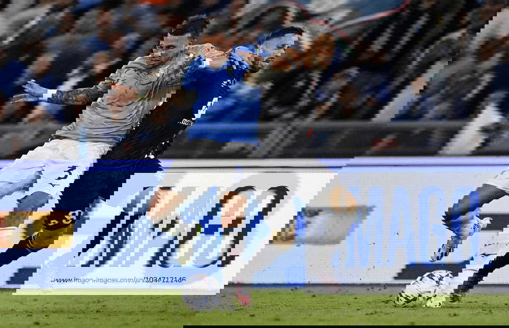 September 23, 2023, Rome: Lazio s Luca Pellegrini (L) in action against Monza s Jean-Daniel Akpa