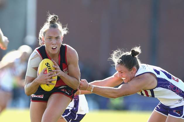 AFLW BOMBERS DOCKERS, Stephanie Cain of the Bombers takes a mark during ...