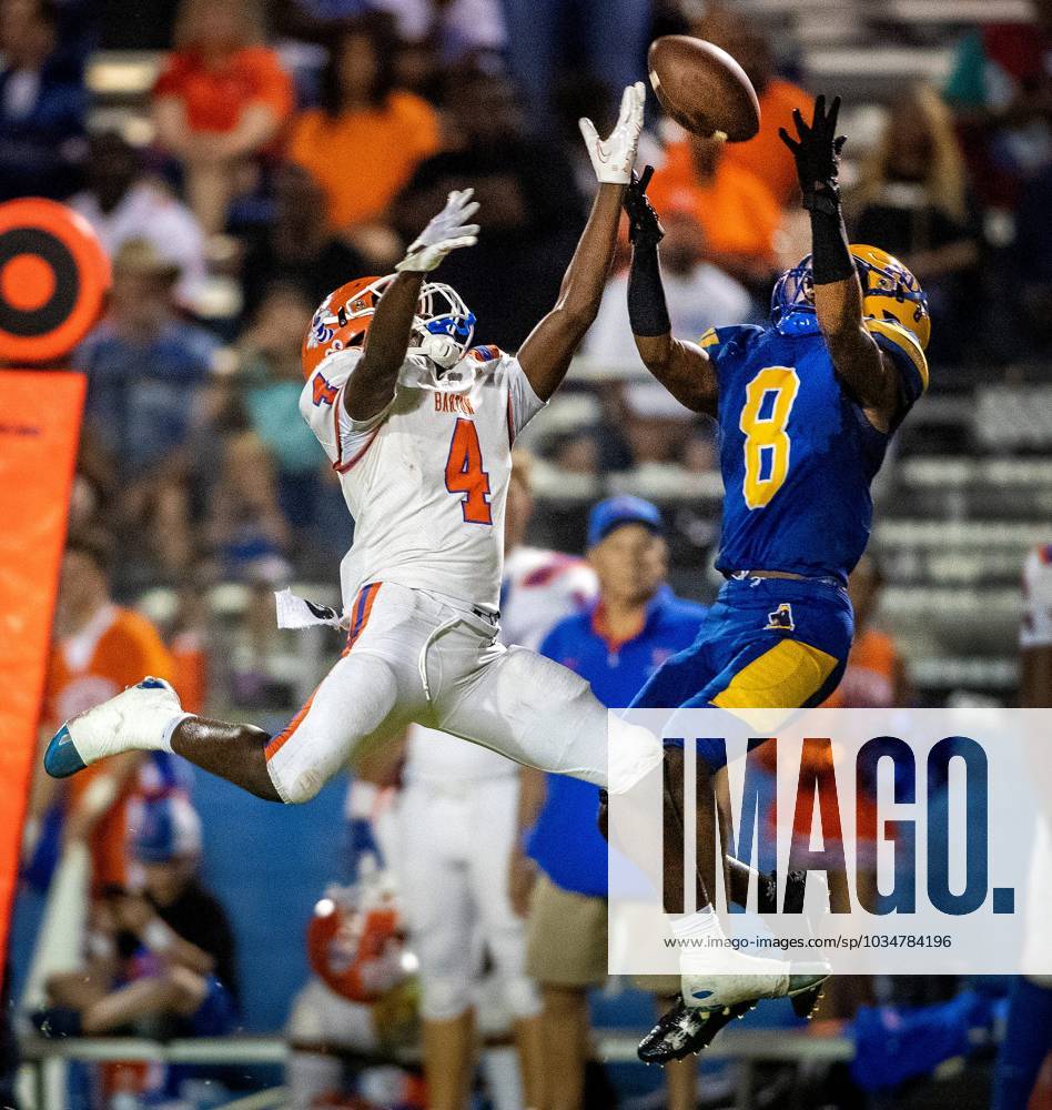 Syndication: Lakeland Ledger Bartow (4) Kamarion Thomas reaches for a ...