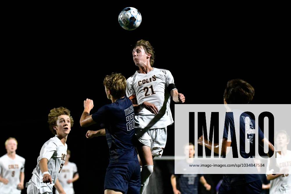 Syndication: The Courier-Journal DeSales Tyler Mudd (21) heads the ball ...