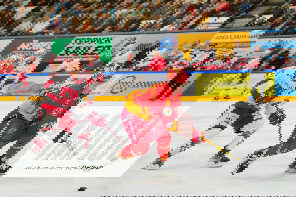 Max Oswald 9, ESV Kaufbeuren at the puck, Marius Erk 23, EC Bad Nauheim ...