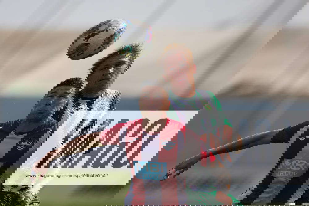 TA QALI, OCTOBER 01: Maksim Valadzko (R) of Floriana vies for the ball ...