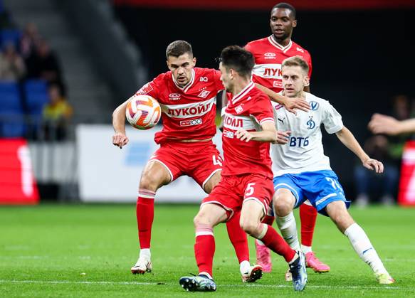 RUSSIA, MOSCOW - OCTOBER 4, 2023: Spartak Moscow s Roman Zobnin (L) and ...