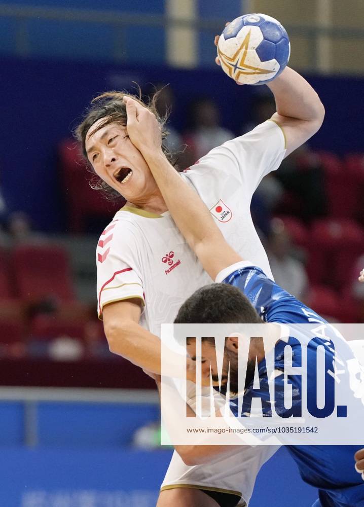 Asian Games: Handball Japan s Hiroki Motoki scores a goal during the ...