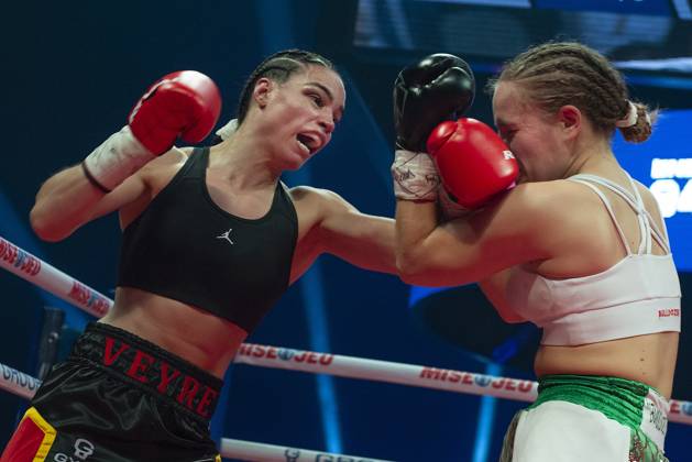 Laval, PQ, CANADA: Featherweight Caroline Veyre, left, fights from the ...