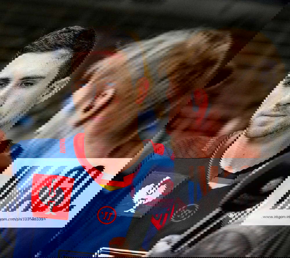 Ryan McKiernan EHC Red Bull Muenchen, 58 is drawn during TV interview ...